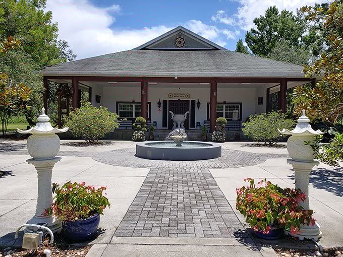 The meditation center's simple exterior belies the peaceful sanctuary within, where spiritual practice meets architectural beauty.