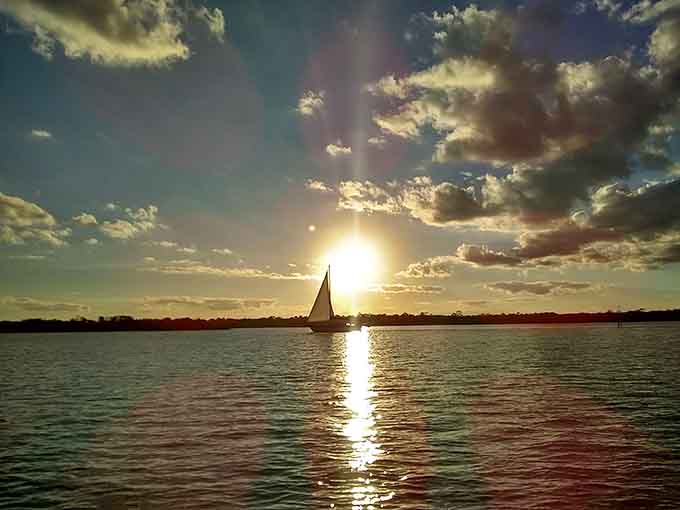 Sailboats gliding across the lagoon at sunset create postcard-perfect moments that remind you why Florida living is pretty special.