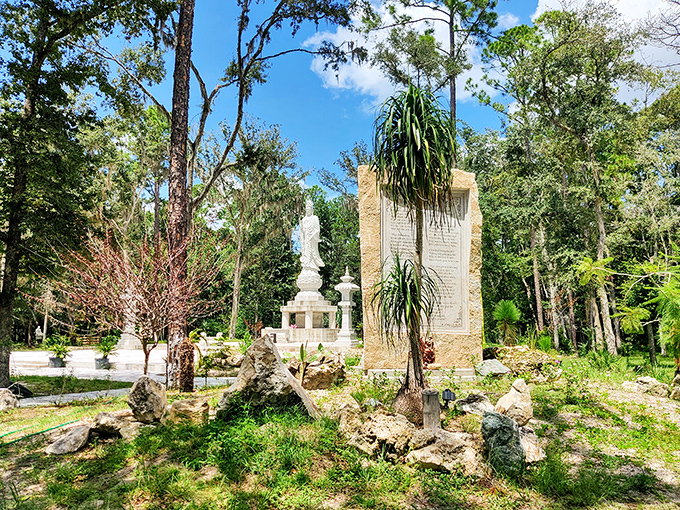 Stone lanterns and carefully placed monuments create visual harmony throughout the grounds, blending Eastern tradition with Florida's natural landscape.