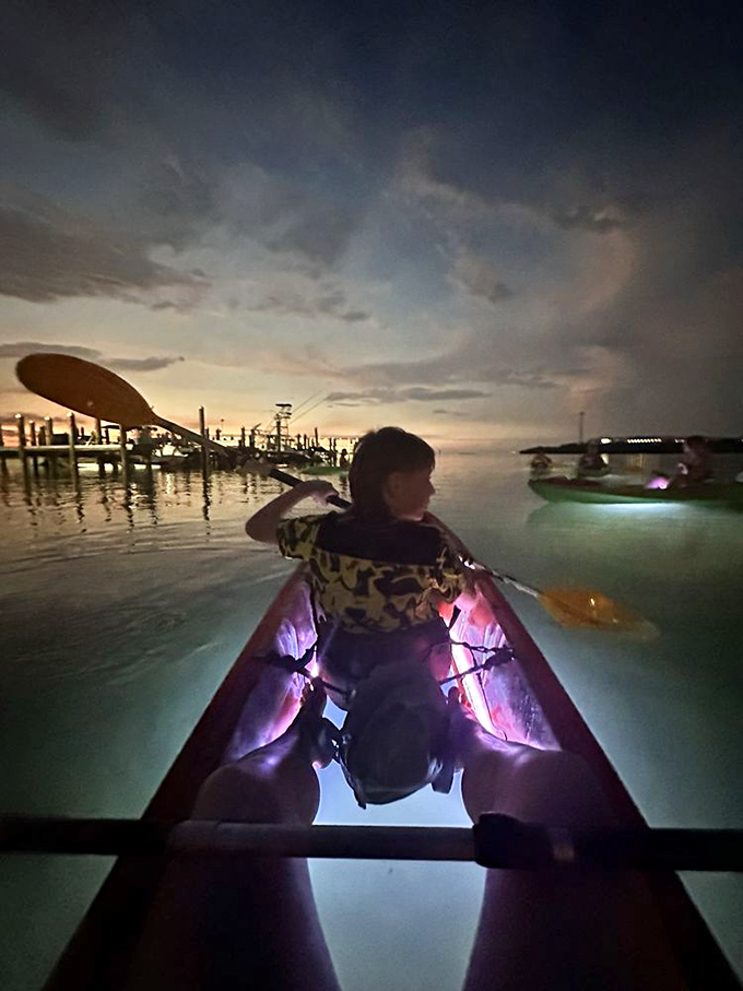 Night kayak adventure: Transparent kayaks transform into personal aquariums as LED lights reveal the underwater ballet happening just inches below paddlers' seats.