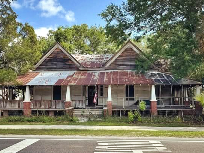 This weathered wooden home with its rusty tin roof tells silent stories of Sopchoppy's past &ndash; architectural poetry written in weathered clapboard.