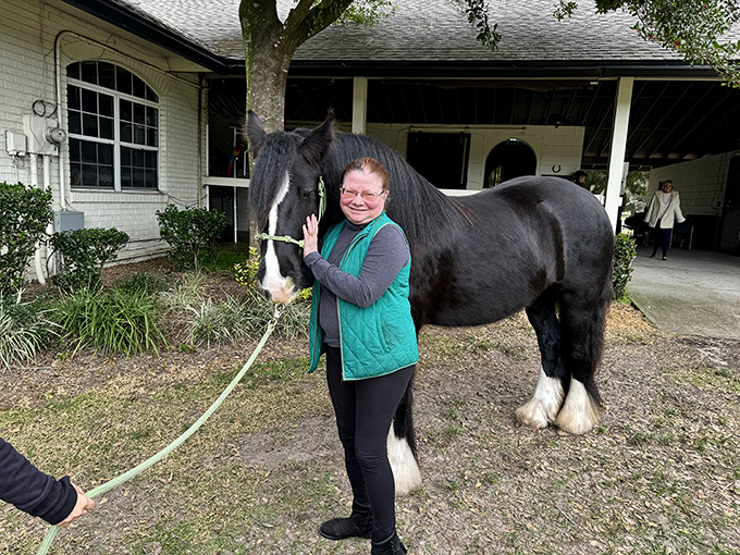 That magical moment when you realize this magnificent creature is gentler than your average house cat—and significantly more photogenic.