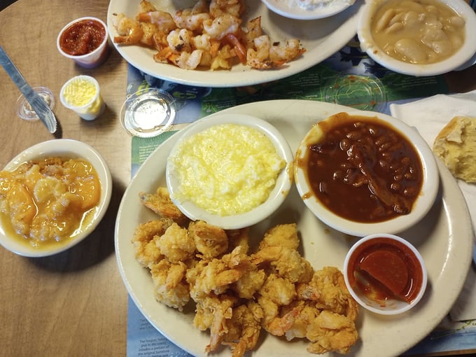Golden-fried shrimp and classic sides create a plate that's worth every single calorie &ndash; diet plans were made to be broken here.