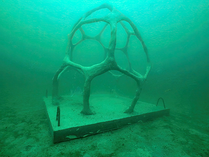 "Space Nest" creates an underwater architectural wonder where fish dart through openings like commuters at Grand Central Station.