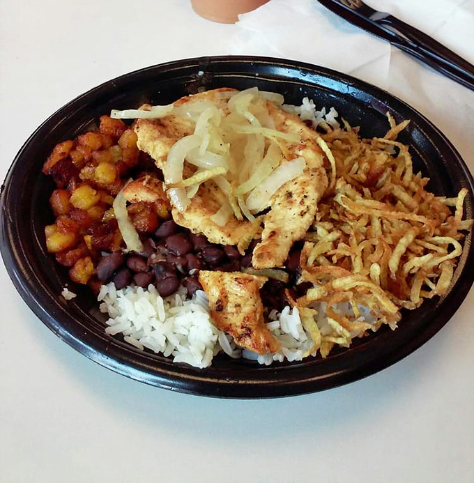 Who says healthy can't be heavenly? This Vaca Frita salad brings all the flavor without the bread, proving Cuban cuisine can satisfy any dining preference.