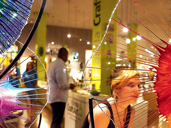 Art appreciation in action: visitors become part of the installation as they interact with these larger-than-life creations.