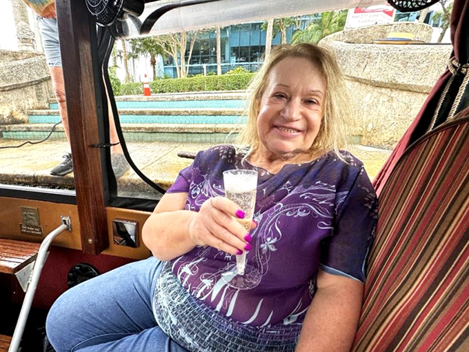 A passenger enjoys the simple luxury of champagne on the water &ndash; proving some of life's finest pleasures need no explanation.