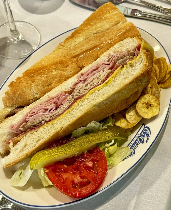 The legendary Cuban sandwich in all its glory&mdash;pressed to perfection with that distinctive diagonal cut that separates the amateurs from the sandwich artisans.