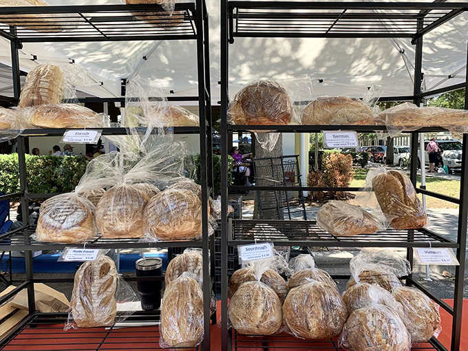 Carb heaven alert! Artisanal loaves stacked like edible architecture &ndash; each one promising that perfect combination of crusty exterior and pillowy inside.