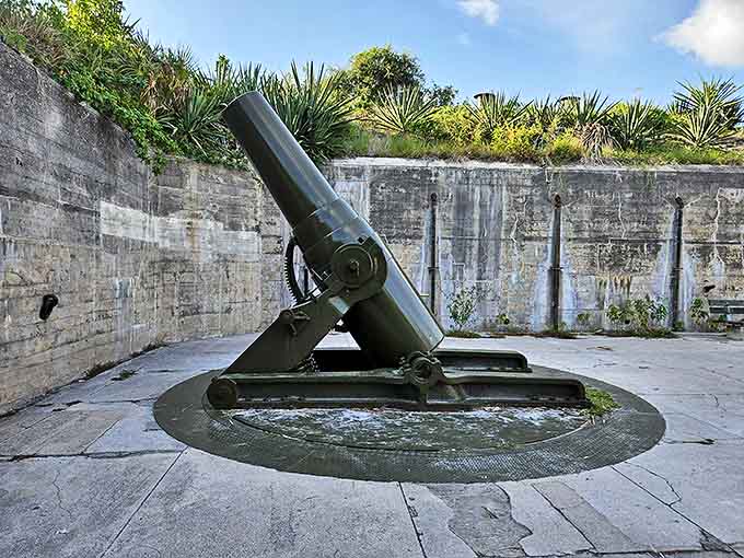 This massive mortar once stood ready to defend against invaders who never came. Now it silently watches over beachgoers instead of battleships.