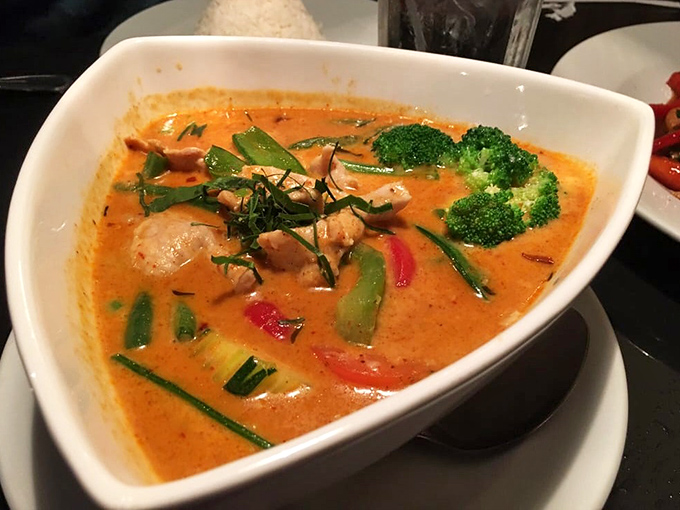 A closer look reveals the careful composition &ndash; tender chicken, crisp vegetables, and that luxurious curry sauce begging to be spooned over rice.