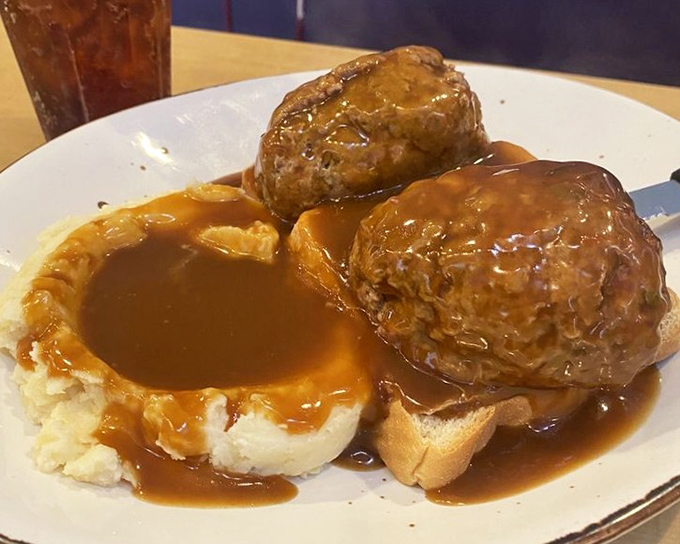Open-faced meatloaf – where gravy pools in all the right places and those mashed potatoes could make a grown man weep with joy.