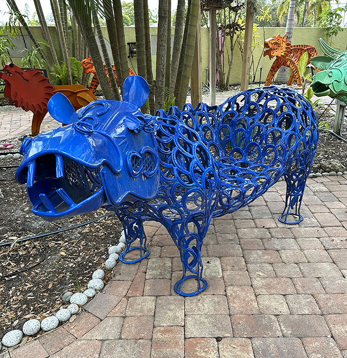 This blue hippo sculpture looks like it's laughing at everyone who packed winter clothes for their Florida vacation.