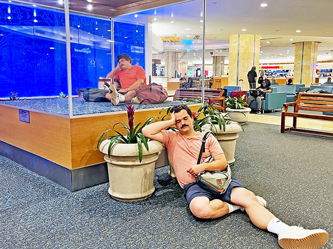 Double vision? Visitors often recreate the sculpture's pose, creating a meta moment of art imitating life imitating art.