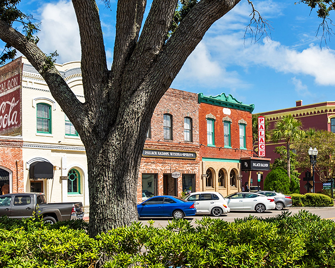 Fernandina Beach's charming downtown features brick buildings with colorful awnings, creating a picturesque setting for family walks.