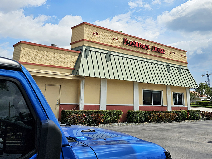 The mint-green awning and classic lines of Flashback Diner create the perfect retro atmosphere before you even step inside.