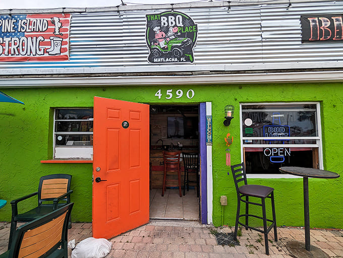 The orange door opens to island-style BBQ that perfectly captures the quirky spirit of this artistic community.
