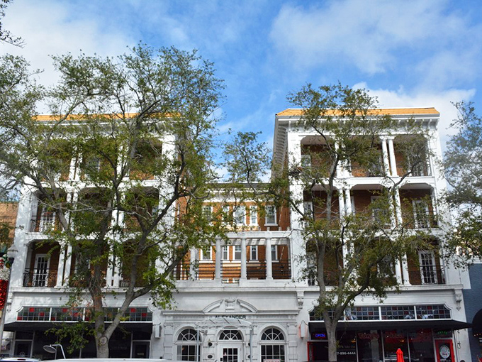 The stately Alexander Hotel provides a classic backdrop to the district's more contemporary artistic expressions.