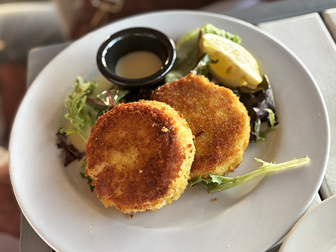 Alley's Crab Cake: A masterclass in seafood preparation &ndash; crispy exterior giving way to sweet, tender crab meat that tastes like the ocean itself.