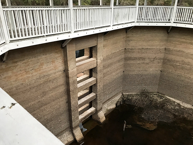 The bathhouse's interior reveals the careful engineering that went into creating this spring enclosure, with walls that have withstood over a century of Florida's humidity.