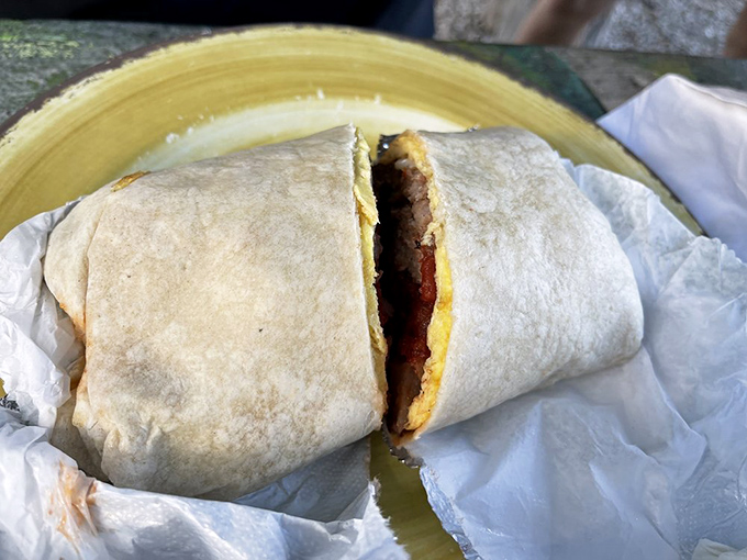 A tortilla-wrapped miracle that somehow manages to contain all your breakfast dreams in one handheld package.