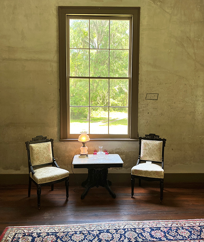 A quiet conversation spot where 19th-century guests might have exchanged gossip or discussed politics over afternoon tea.
