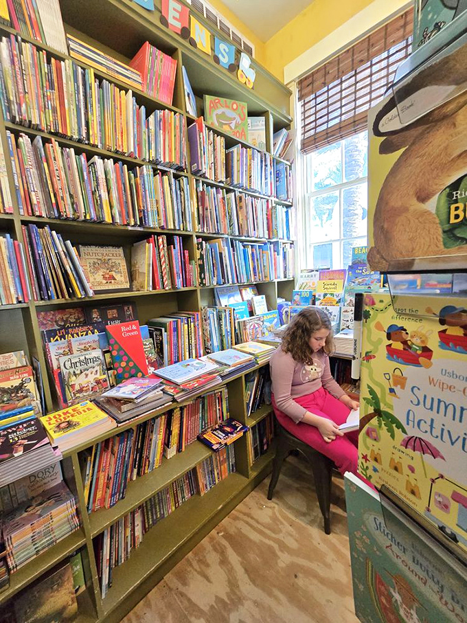 A young reader finds her perfect nook among floor-to-ceiling children's books &ndash; this cozy corner has launched countless literary love affairs.