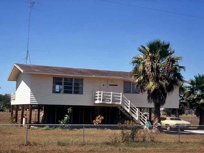 Houses on stilts dot the landscape, standing tall against floods and storms like Florida's version of treehouses for grown-ups.