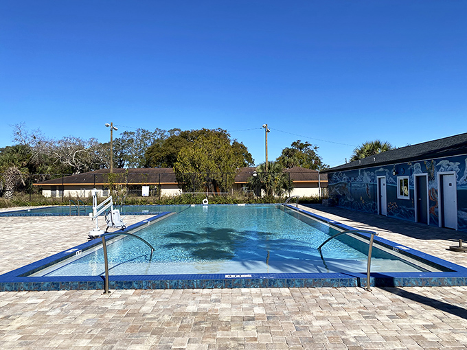 Eatonville's community pool gleams like a sapphire under the Florida sun, offering cool relief and warm social connections.