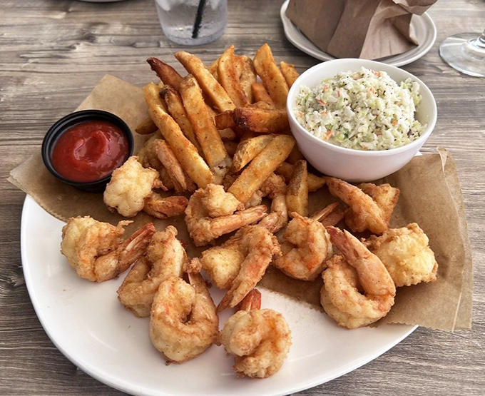 Golden-fried shrimp with hand-cut fries and homemade coleslaw &ndash; the holy trinity of Gulf Coast comfort food.