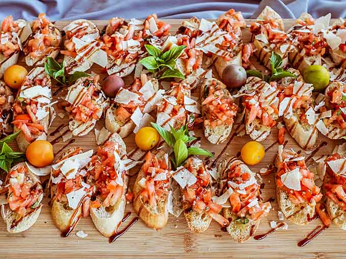 Bruschetta topped with enough deliciousness to make you question why you ever ate plain bread, like some kind of medieval peasant without options.