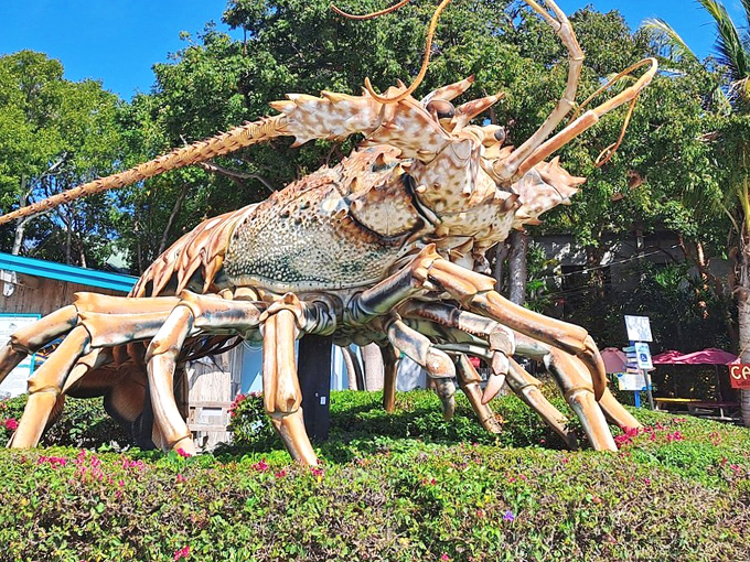 Low-angle view: Looking up at Betsy from below creates a monster-movie perspective that makes her seem even more impossibly large.