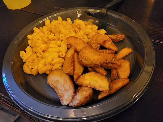 Mac and cheese gets the wizarding treatment &ndash; creamy, cheesy goodness alongside perfectly roasted potatoes that could convert any pasta skeptic.