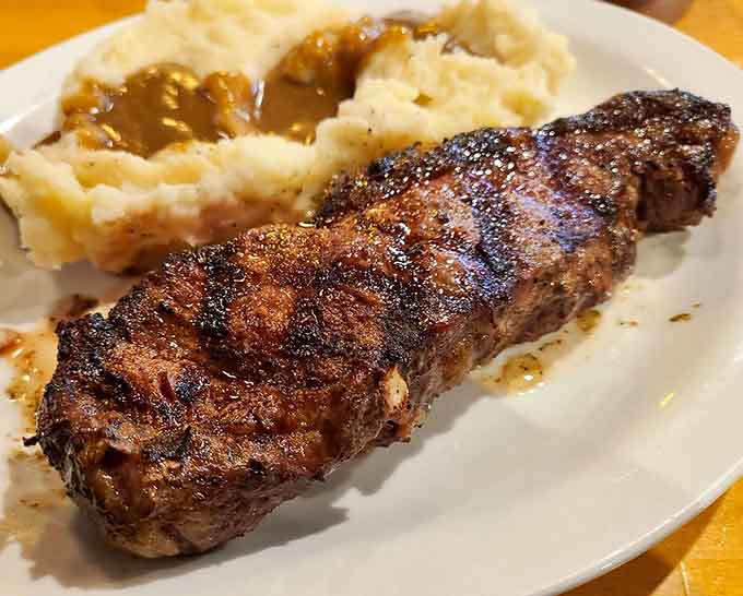 When you need something heartier, these perfectly seasoned pork chops deliver old-school steakhouse satisfaction without the pretension.
