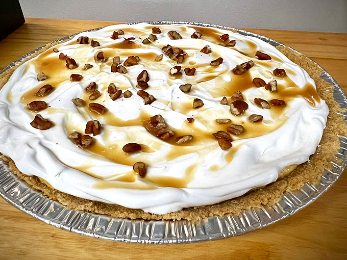 This isn't just pie &ndash; it's a cloud of whipped cream floating atop caramel-drizzled perfection that makes grown adults fight over the last slice.