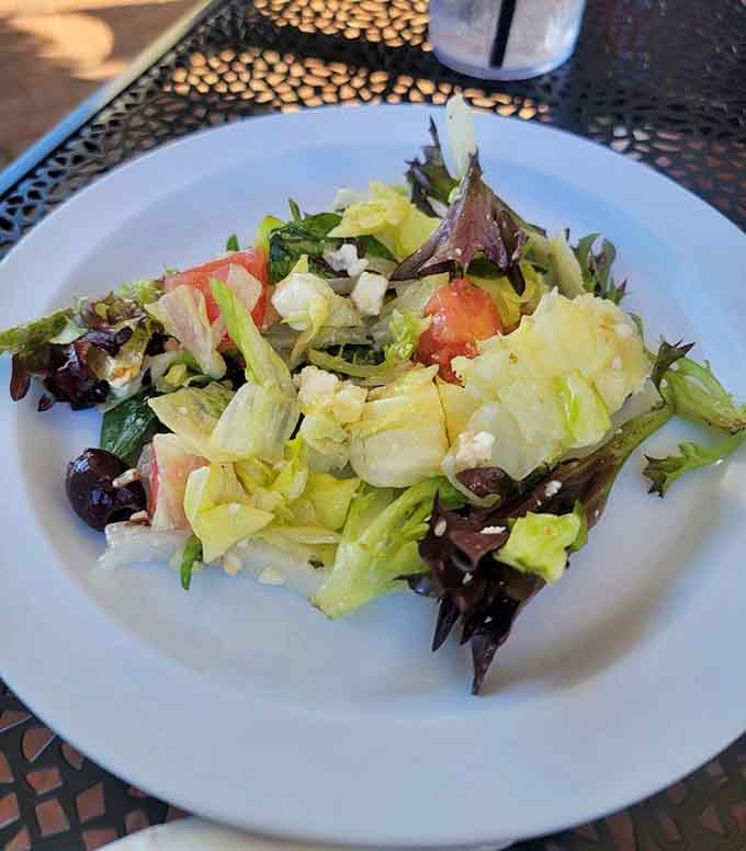 Fresh salads provide a virtuous counterbalance to pizza indulgence, or at least make you feel slightly better about it.