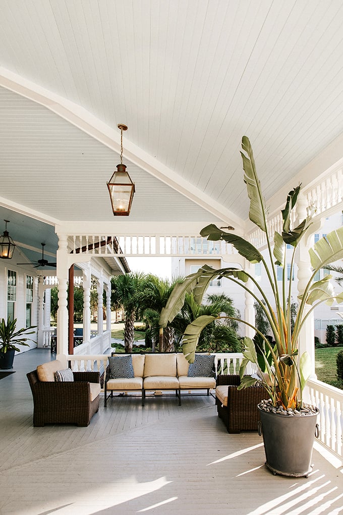 The wraparound porch isn't just architectural eye candy &ndash; it's an invitation to sip something cold while watching the world move at a civilized pace.