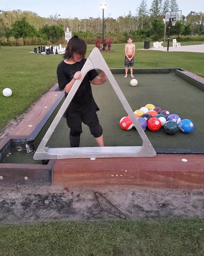 Soccer billiards proves everything is better when supersized. It's like regular pool, except you're the cue ball and coordination suddenly matters.