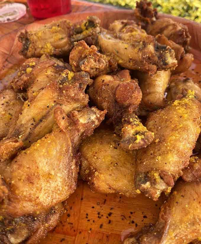 Lemon pepper wings with that perfect crispy coating show this seafood spot knows its way around chicken too.