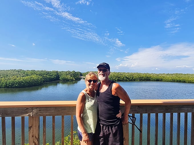 Happy visitors soak in panoramic views from the observation deck. Some vistas don't need filters &ndash; just good company and clear skies.