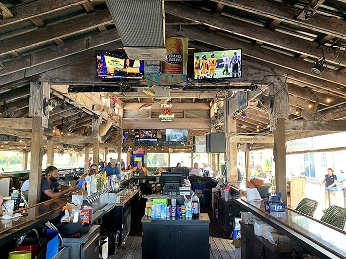 The marina's rustic bar serves up cold drinks and hot stories, where fishing tales grow more impressive with each round ordered.
