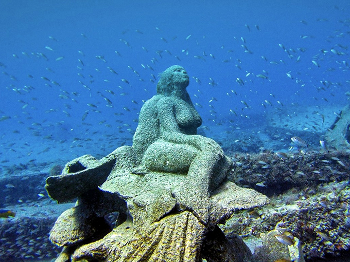 Half woman, half fish, all conservation &ndash; this mermaid sculpture serves as both art piece and essential marine habitat.