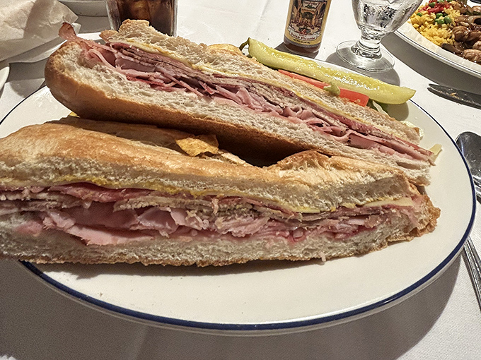 Every bite delivers the perfect ratio of meat to cheese to pickle, a culinary equation that's been perfected over generations of sandwich craftsmanship.