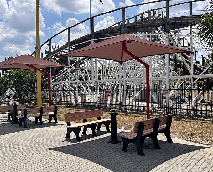 Shaded benches offer front-row seats to White Lightning's wooden coaster symphony. That clickety-clack soundtrack is music to any thrill-seeker's ears.