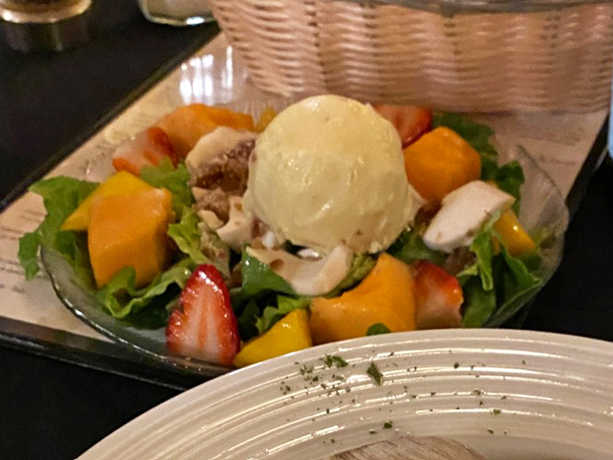 The dressing forms as ice cream slowly melts, creating a sweet symphony that ties together every bite of this iconic Florida creation.