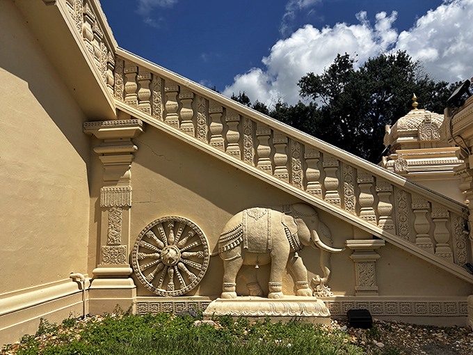 Look closely at the staircase balustrades and you'll find elephants, wheels, and geometric patterns that have adorned Hindu temples for thousands of years.