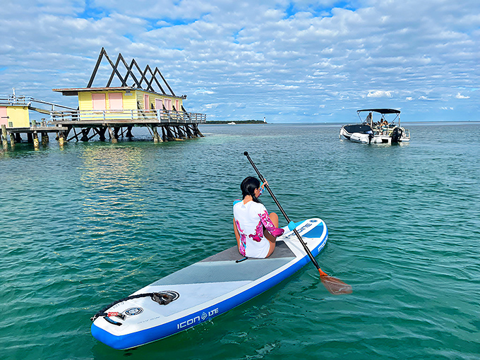 Modern explorers approach these historic structures on paddleboards, proving you don't need a time machine to visit the past.
