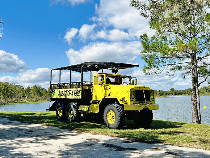 The iconic yellow "Mucky Duck" stands ready for amphibious adventures, part military vehicle, part theme park ride.