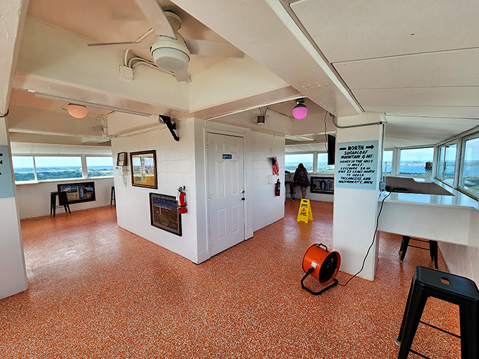 The observation deck's retro-cool interior feels like stepping into a time capsule where the views are timeless and the flooring is delightfully vintage.