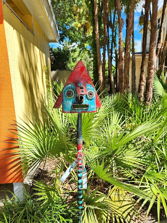 Garden art that makes you smile &ndash; this whimsical creation watches over the garden with metallic charm.